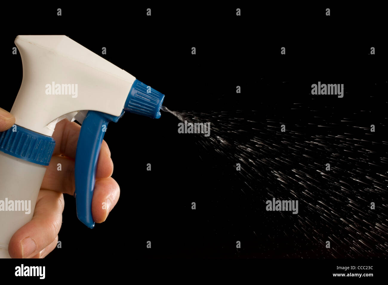 Conceptual spray bottle spraying water hi-res stock photography and ...