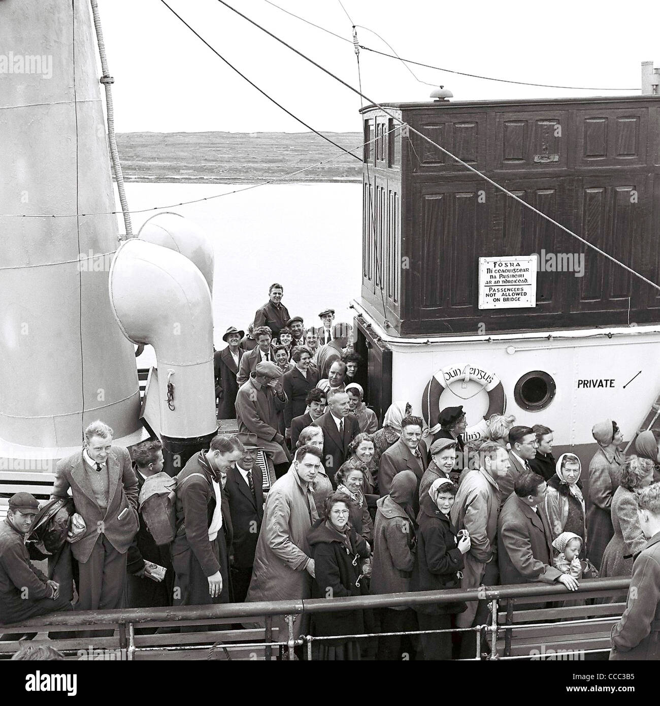 Visitors and locals disembark at the pier in Kilronan- Inis Mor- Aran ...
