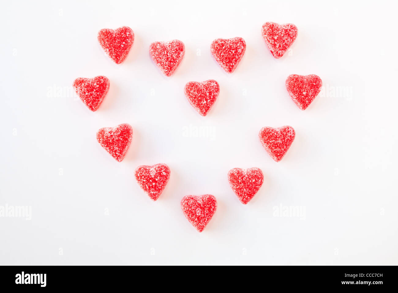 Jelly (gummy) sugar coated candy hearts arranged in the shape of a ...