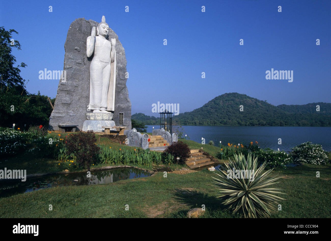 Replica of Aukana Buddha statue and Giritale Wewa lake, Giritale near ...