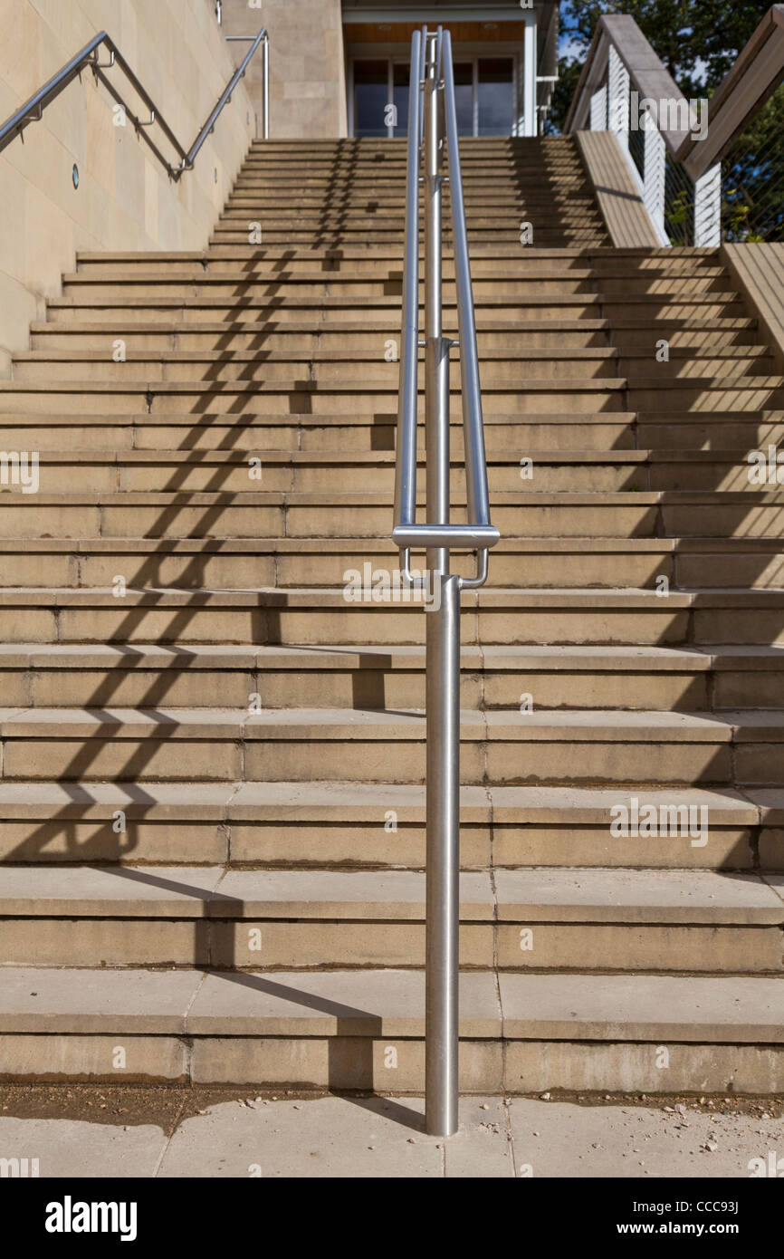 Stone steps and stainless steel handrail leading from the Underground ...