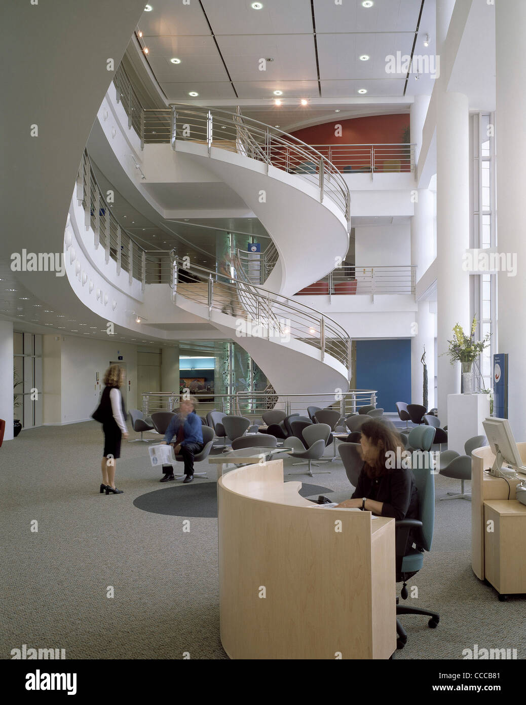 PFIZER HEADQUARTERS PORTRAIT VIEW OF RECEPTION DESK AND SPIRAL STAIRS ...