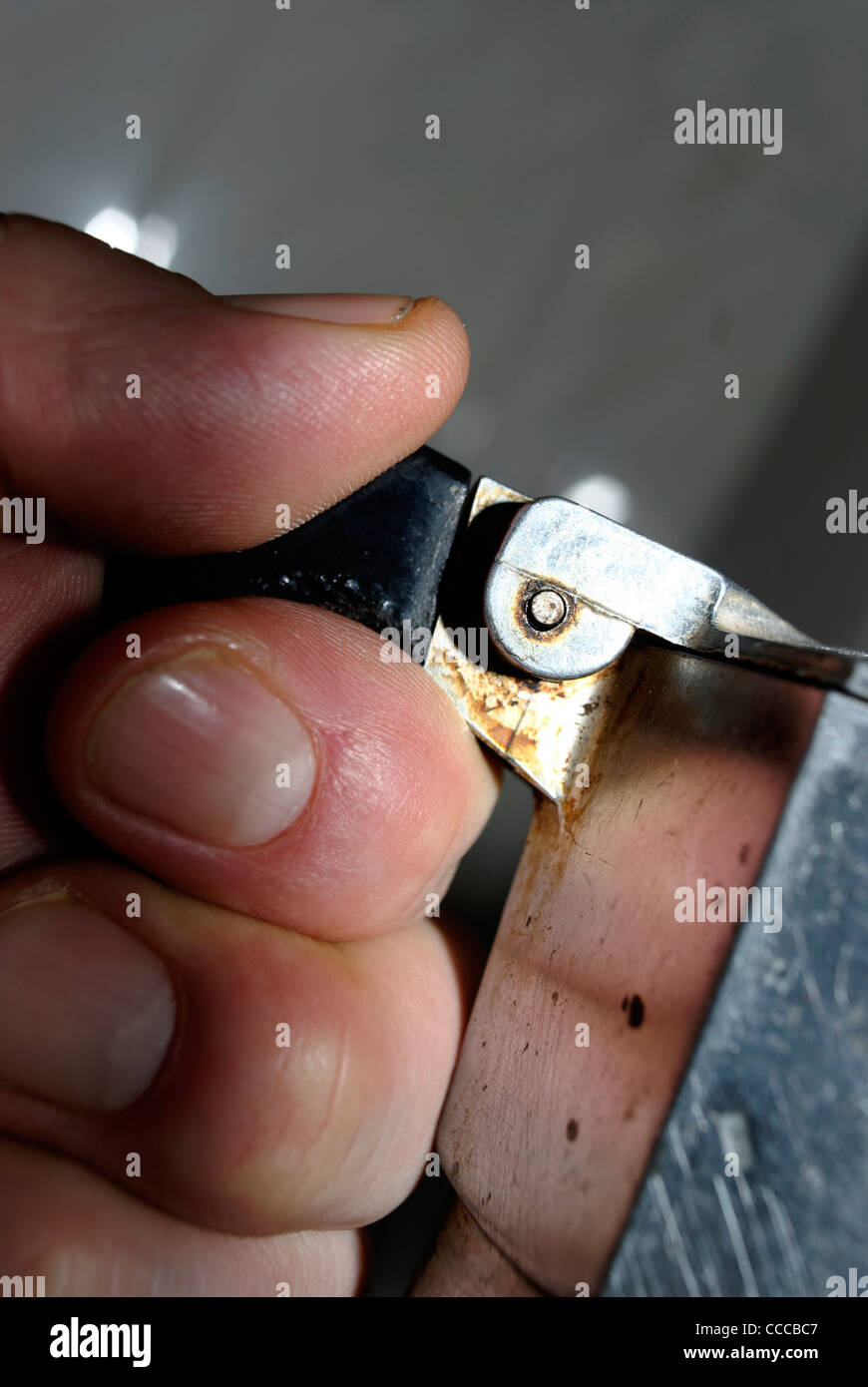 Hand on a coffee pot Stock Photo - Alamy