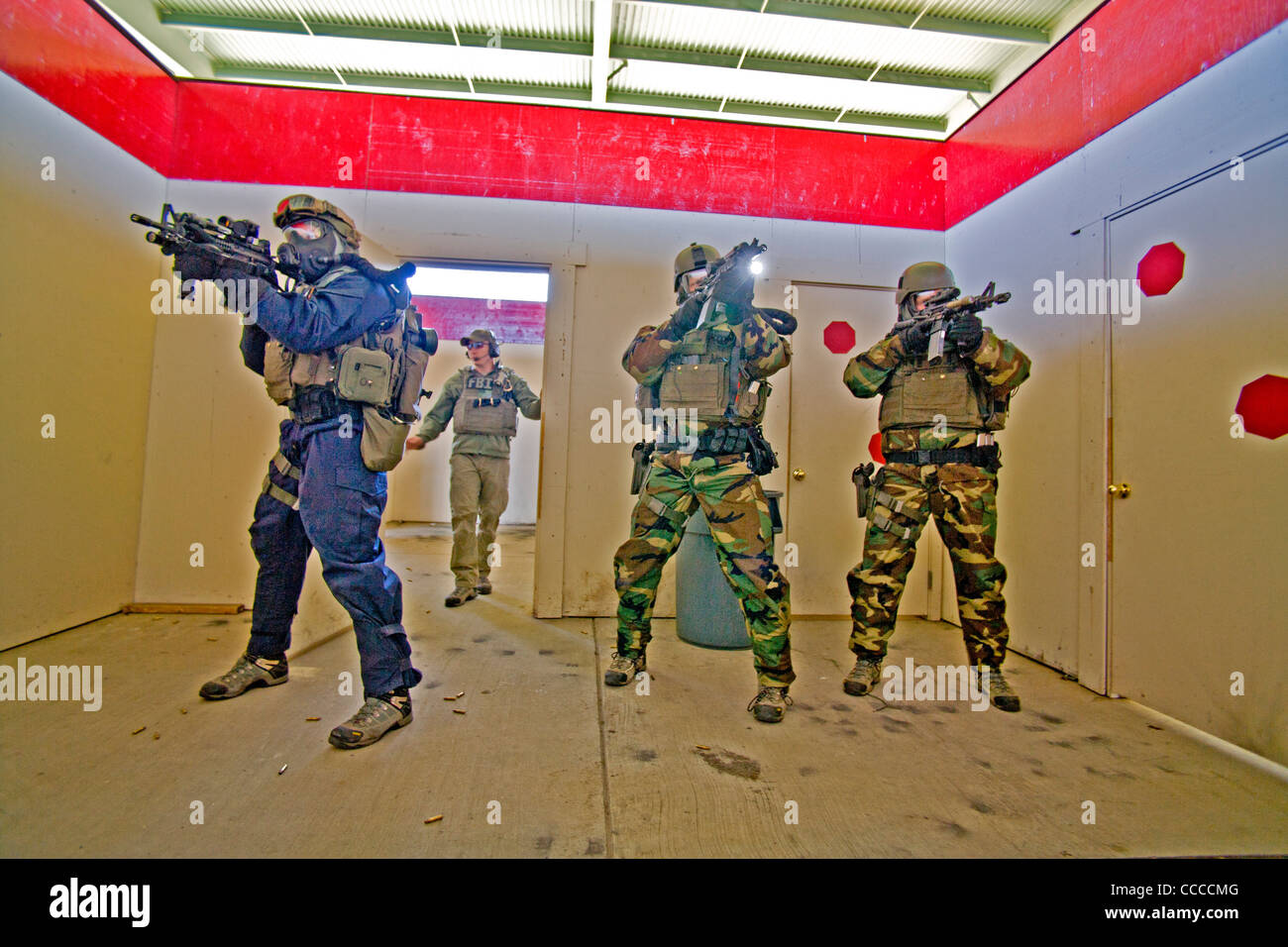 FBI SWAT team practices breaching a room at a "Live Fire Kill House ...