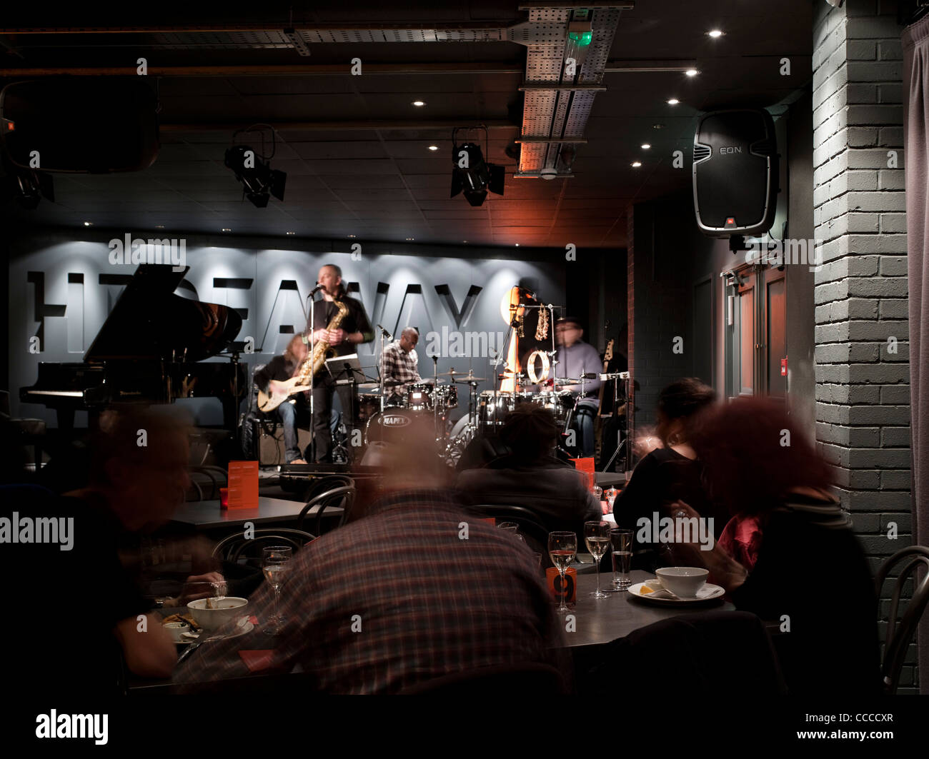 stage with performers and diners Stock Photo - Alamy