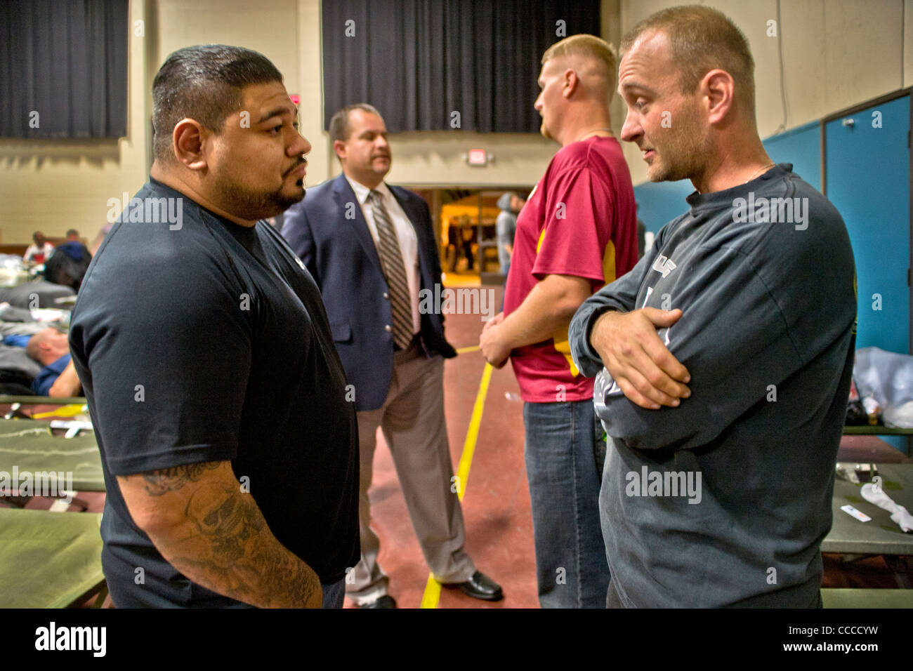 A volunteer advocate for homeless military veterans (black T-shirt ...