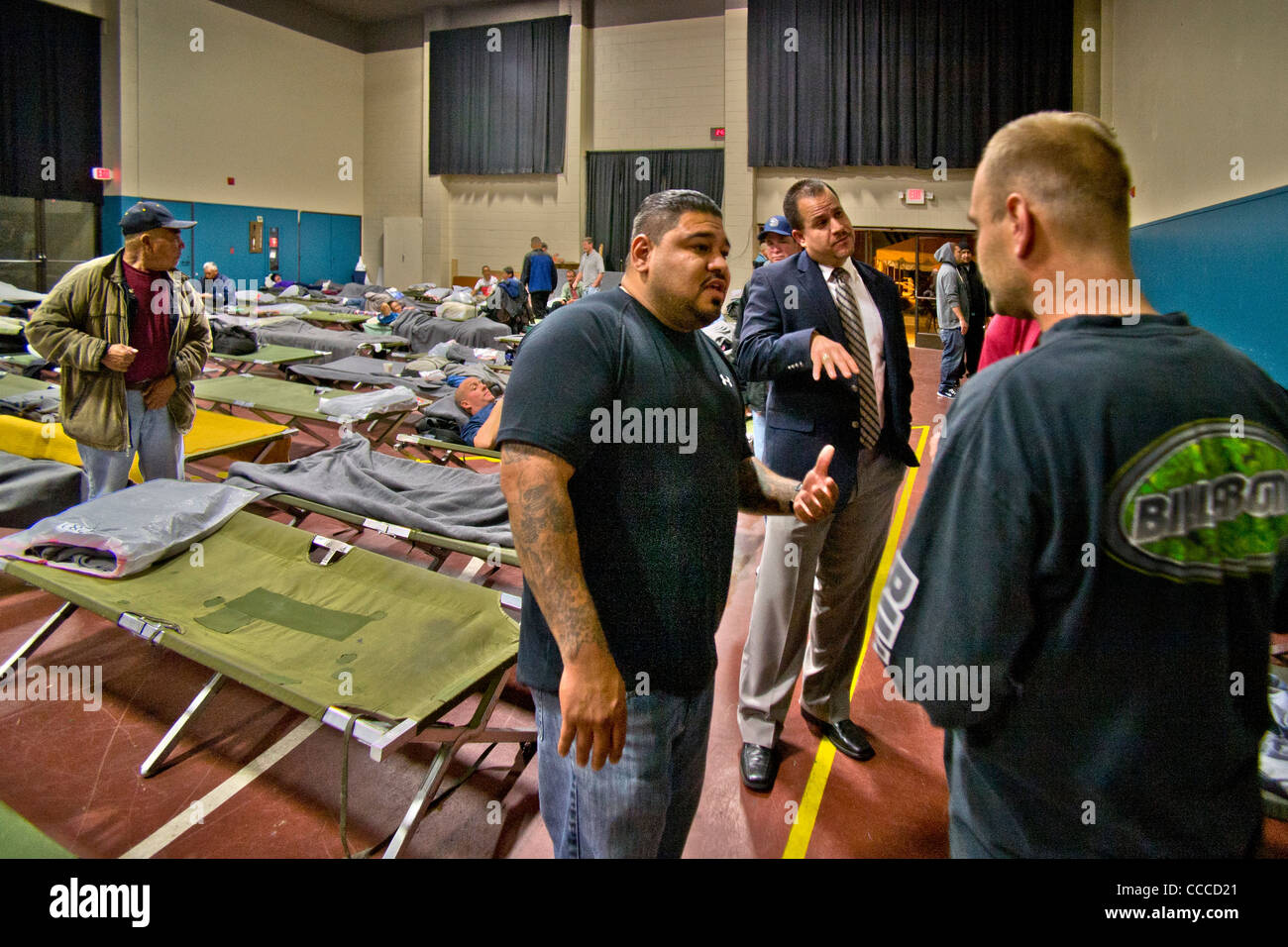 A volunteer advocate for homeless military veterans (black T-shirt ...