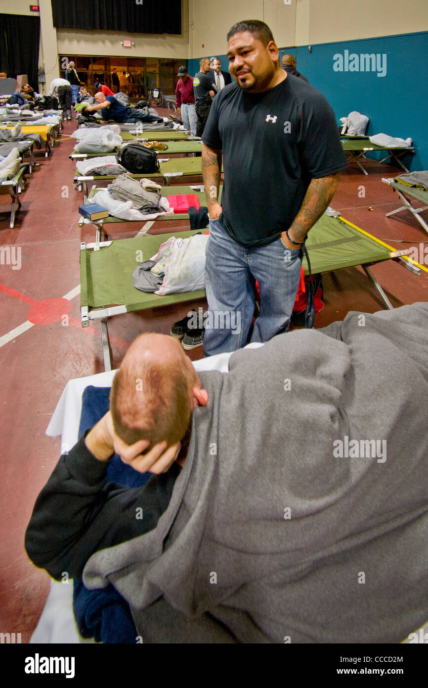 A volunteer advocate for homeless military veterans (black T-shirt ...