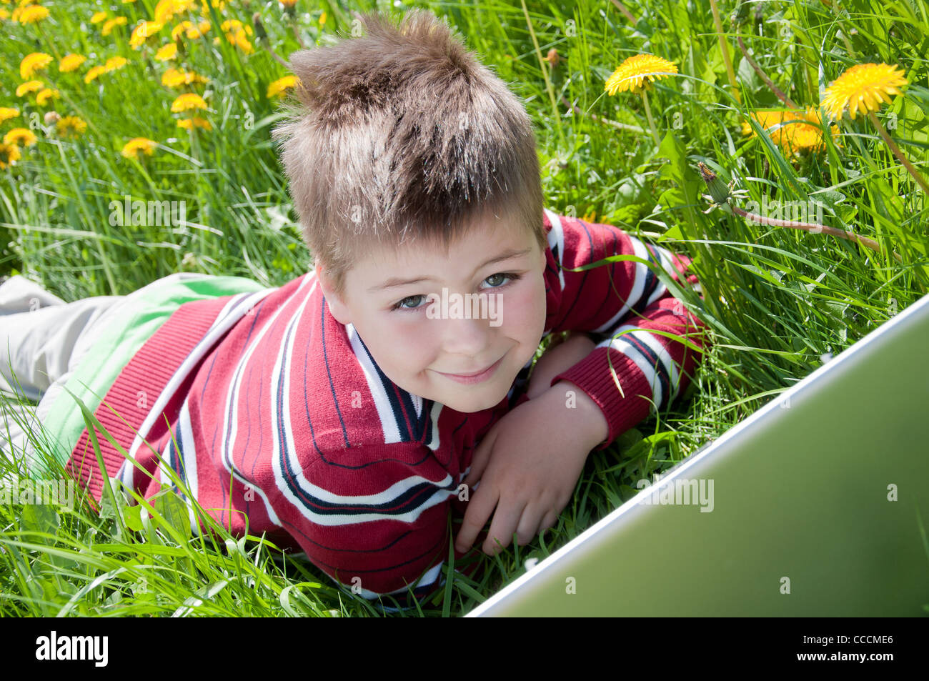boy child one laptop computer Stock Photo - Alamy