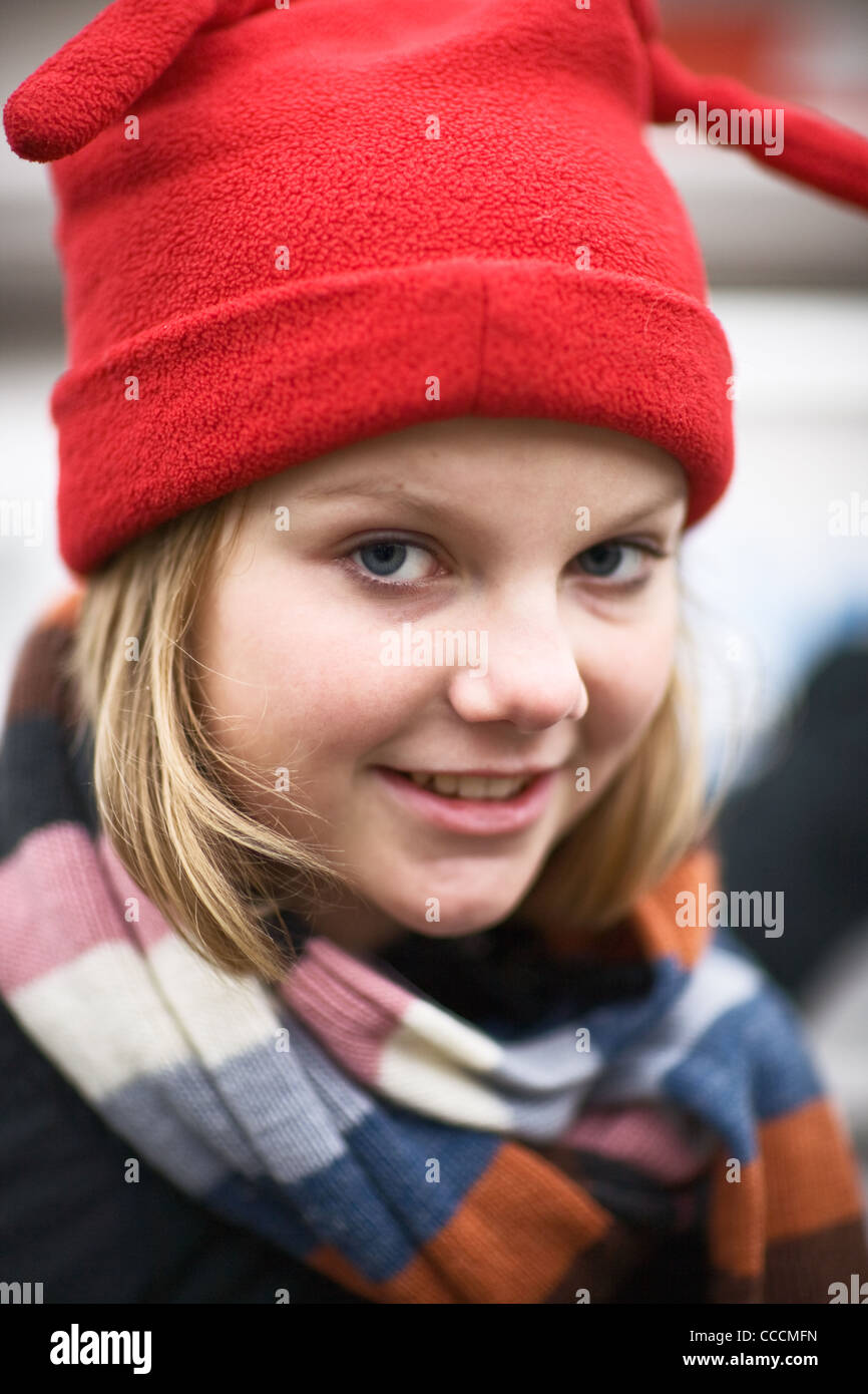 Portrait of girl wearing red knit hat Stock Photo - Alamy