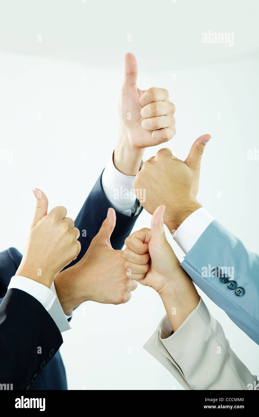 Image of several human hands showing thumbs up in isolation Stock Photo ...