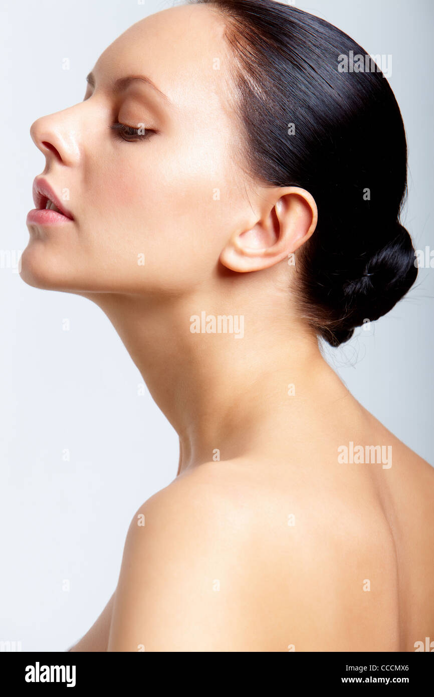 Perfect woman looking at camera over white background Stock Photo - Alamy