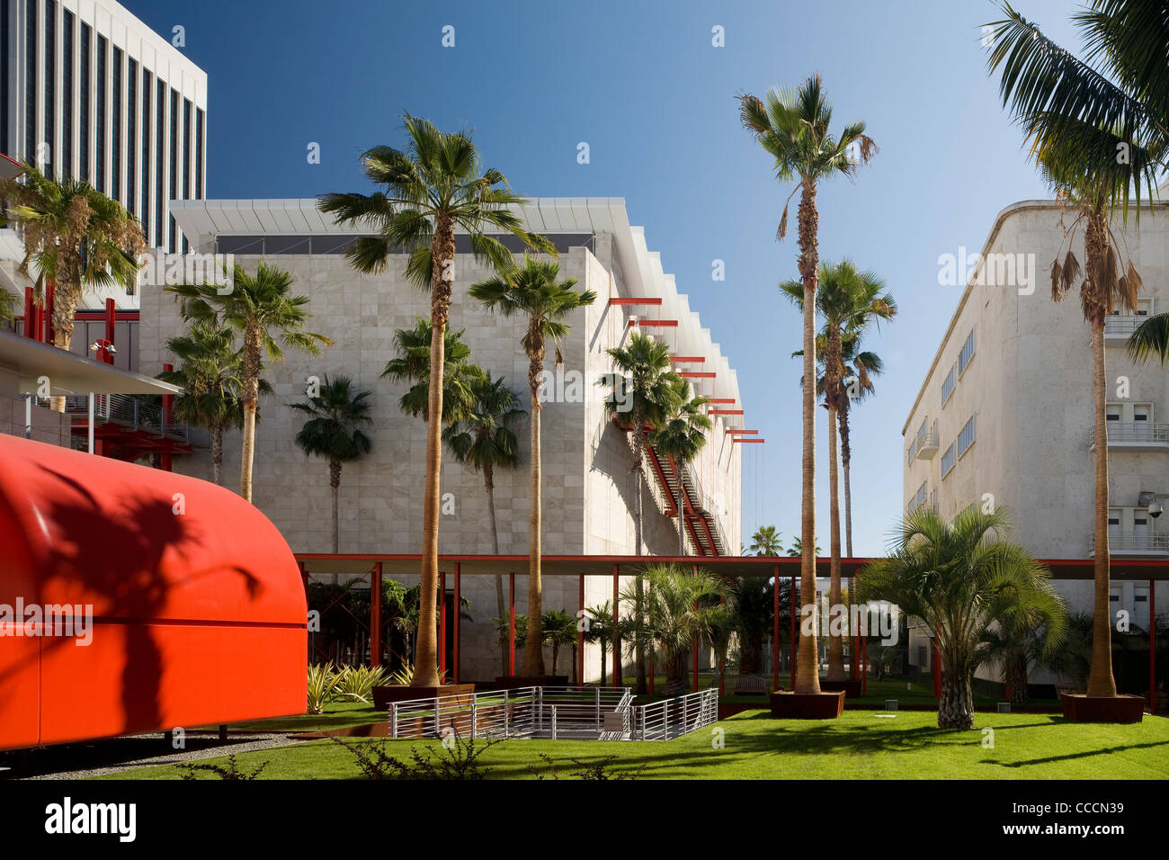 A Glazed Saw Tooth Roof And A Travertine Stone Cladding Surround The ...