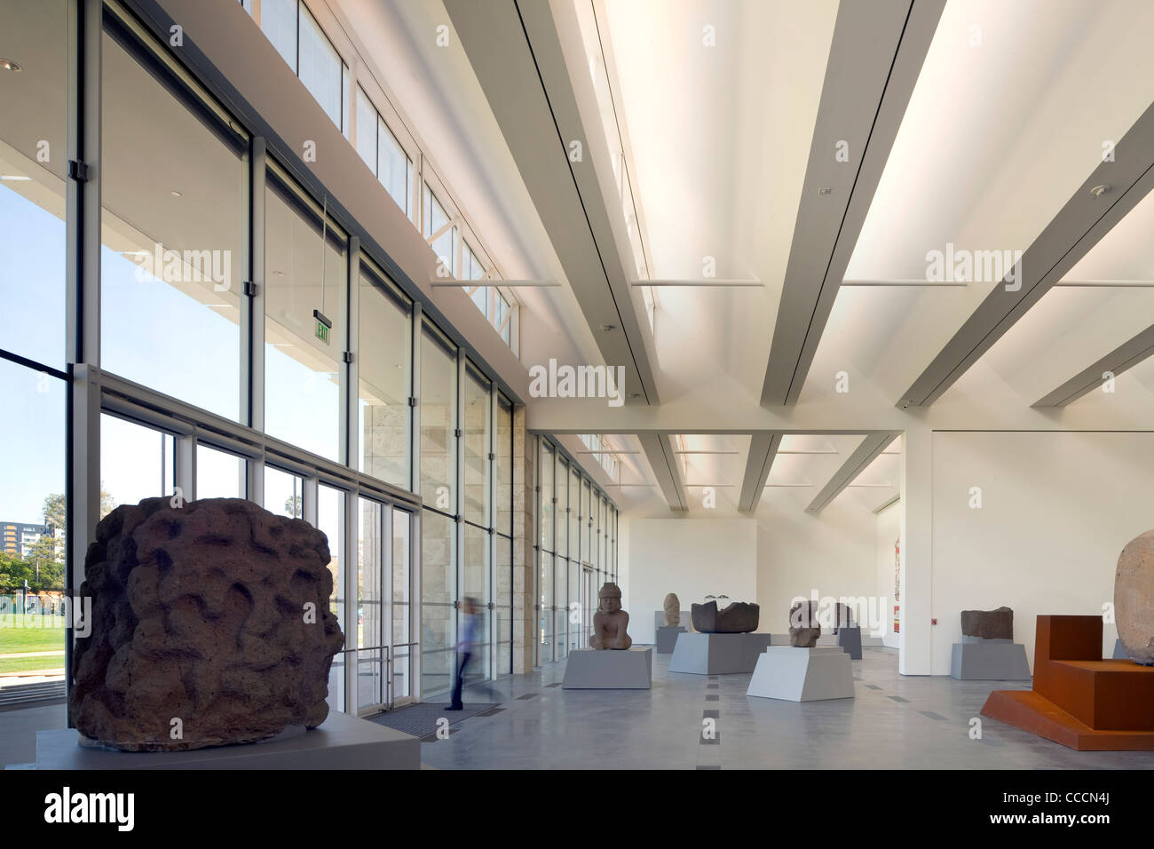 A Glazed Saw Tooth Roof And A Travertine Stone Cladding Surround The ...