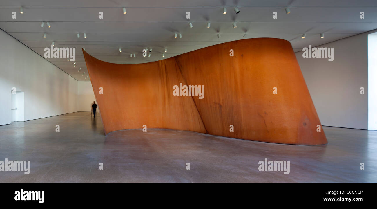 A Glazed Saw Tooth Roof And A Travertine Stone Cladding Surround The ...