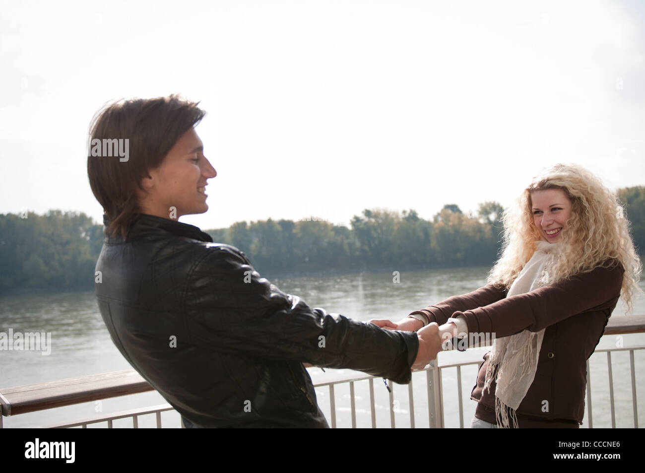 Two friends have fun and enjoy their time together hi-res stock ...