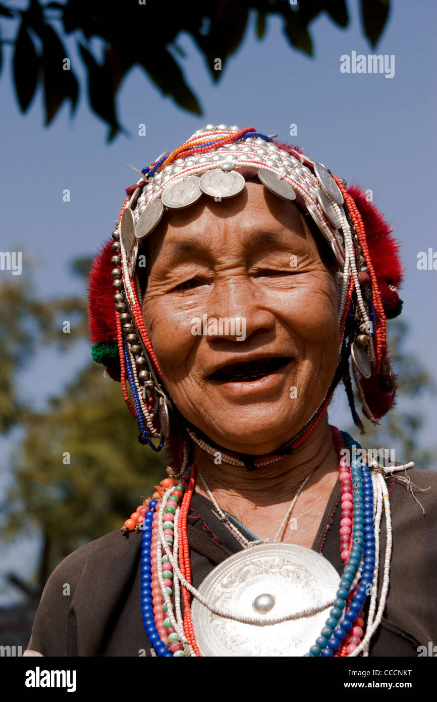 An ethnic hill tribe woman is wearing traditional clothing in Chiang ...