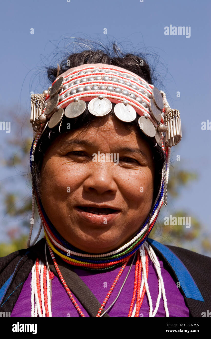 An ethnic hill tribe woman is wearing traditional clothing in Chiang ...