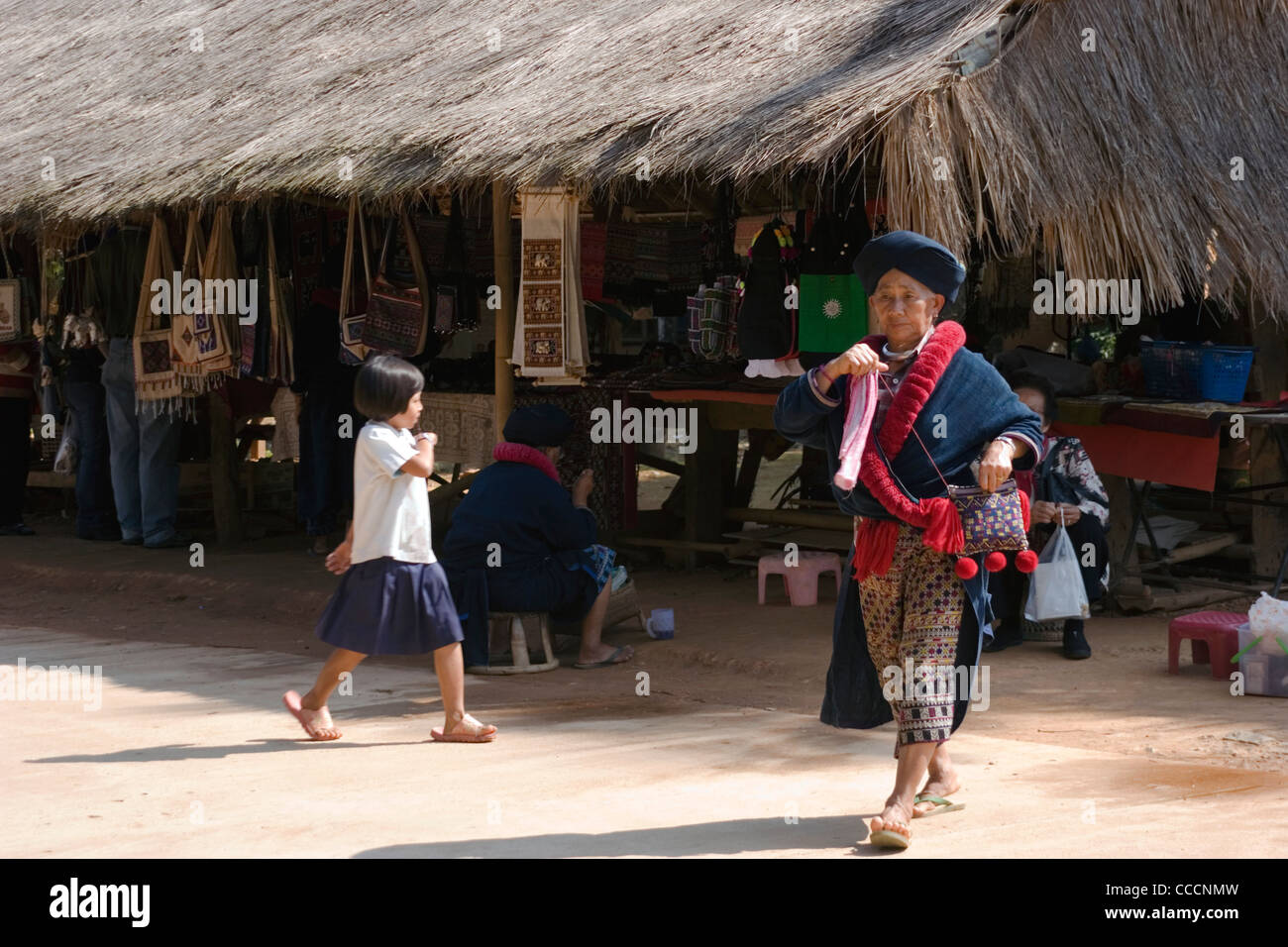 An ethnic Yao hill tribe woman is wearing traditional clothing in ...