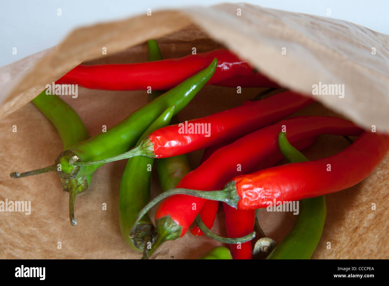 Chilli Pods Vegetables in a brown paper bag Stock Photo - Alamy