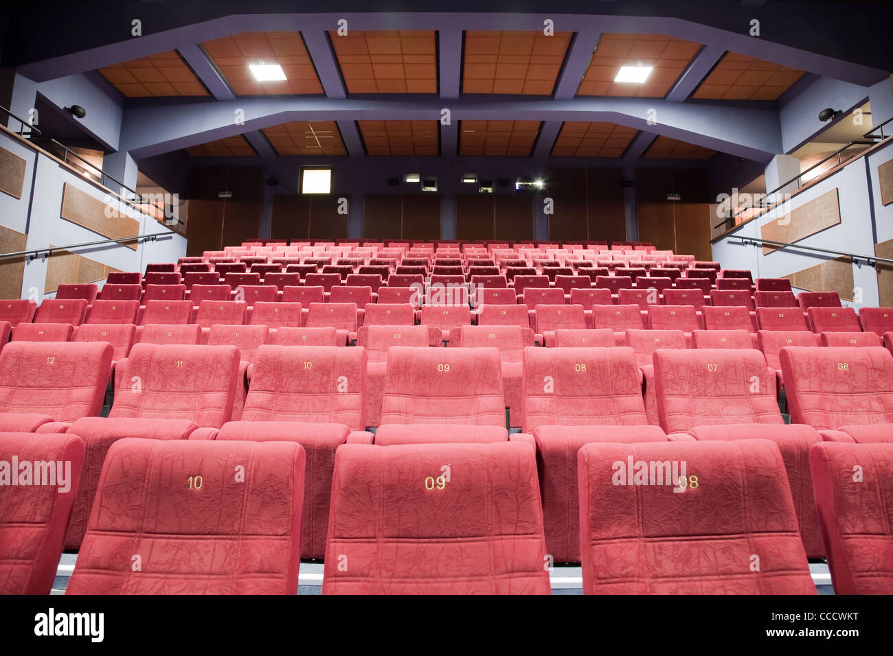 Empty cinema auditorium with line of chairs Stock Photo - Alamy