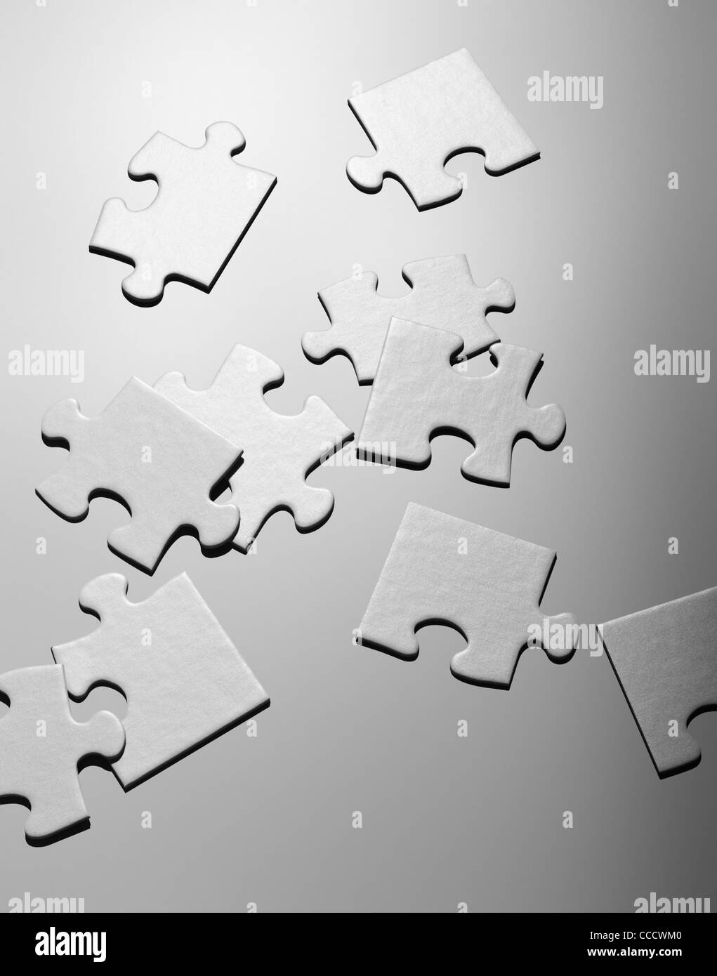 grey puzzle pieces Stock Photo - Alamy