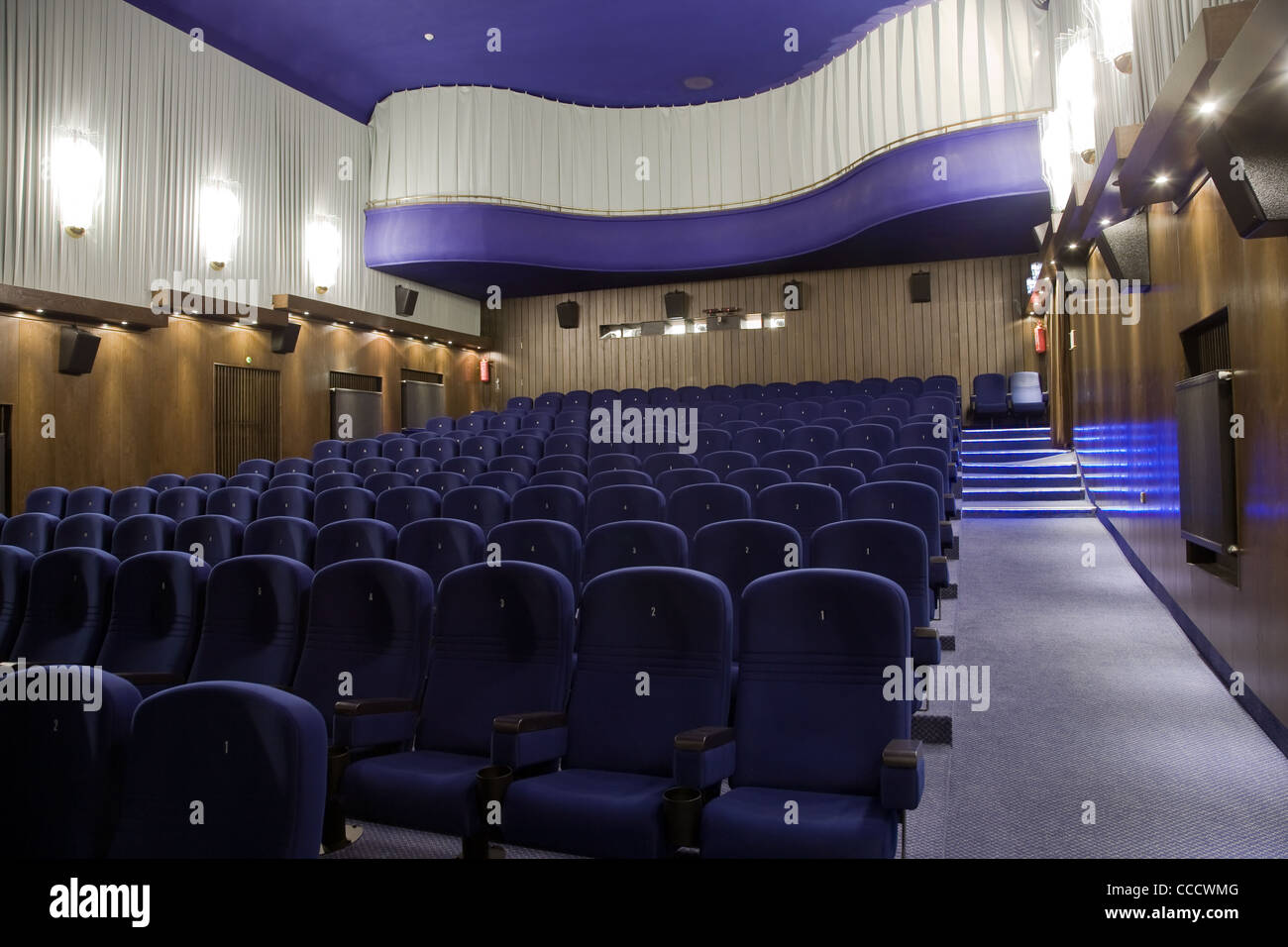 Empty cinema auditorium with line of chairs Stock Photo - Alamy