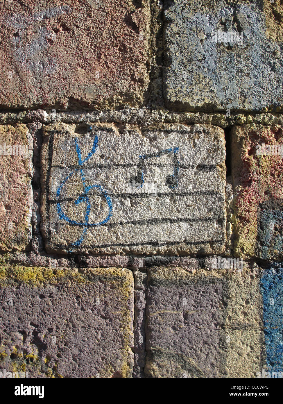 sheet music treble clef composition single note design on brick wall in ...