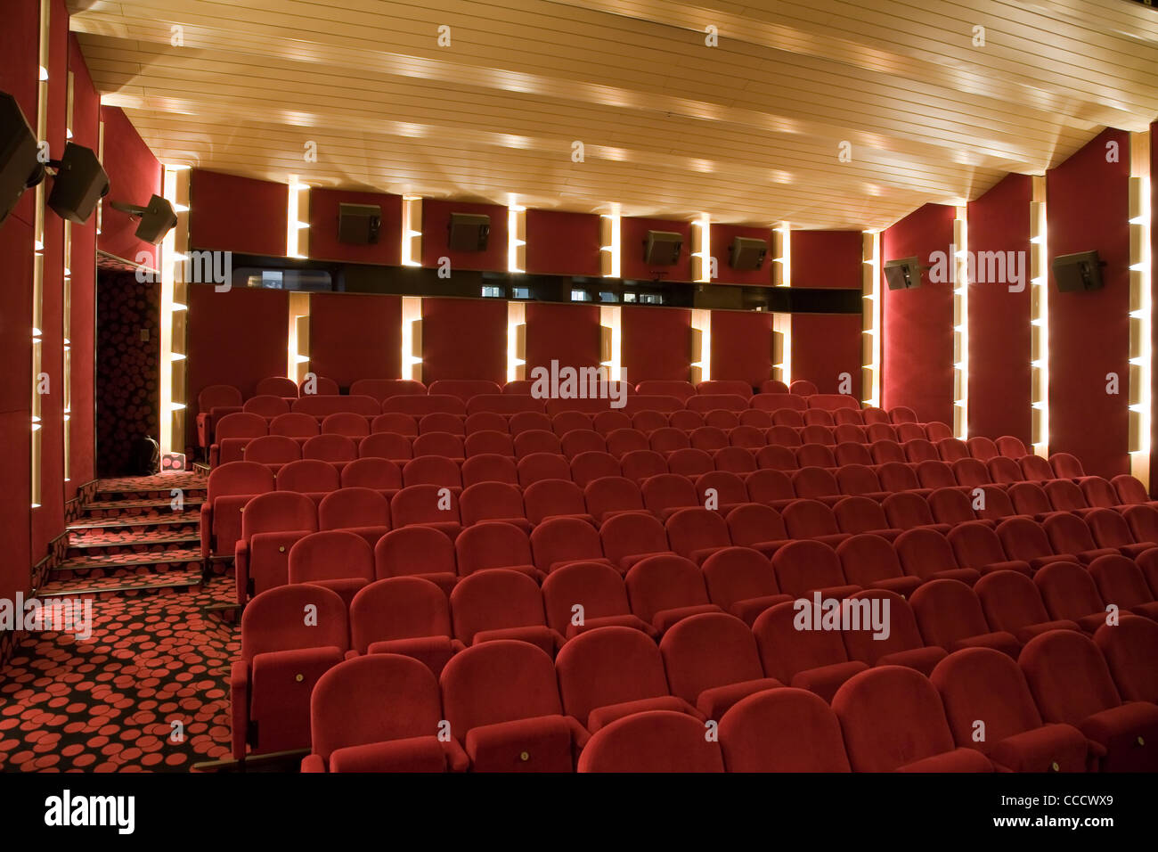 Empty cinema auditorium with line of chairs Stock Photo - Alamy