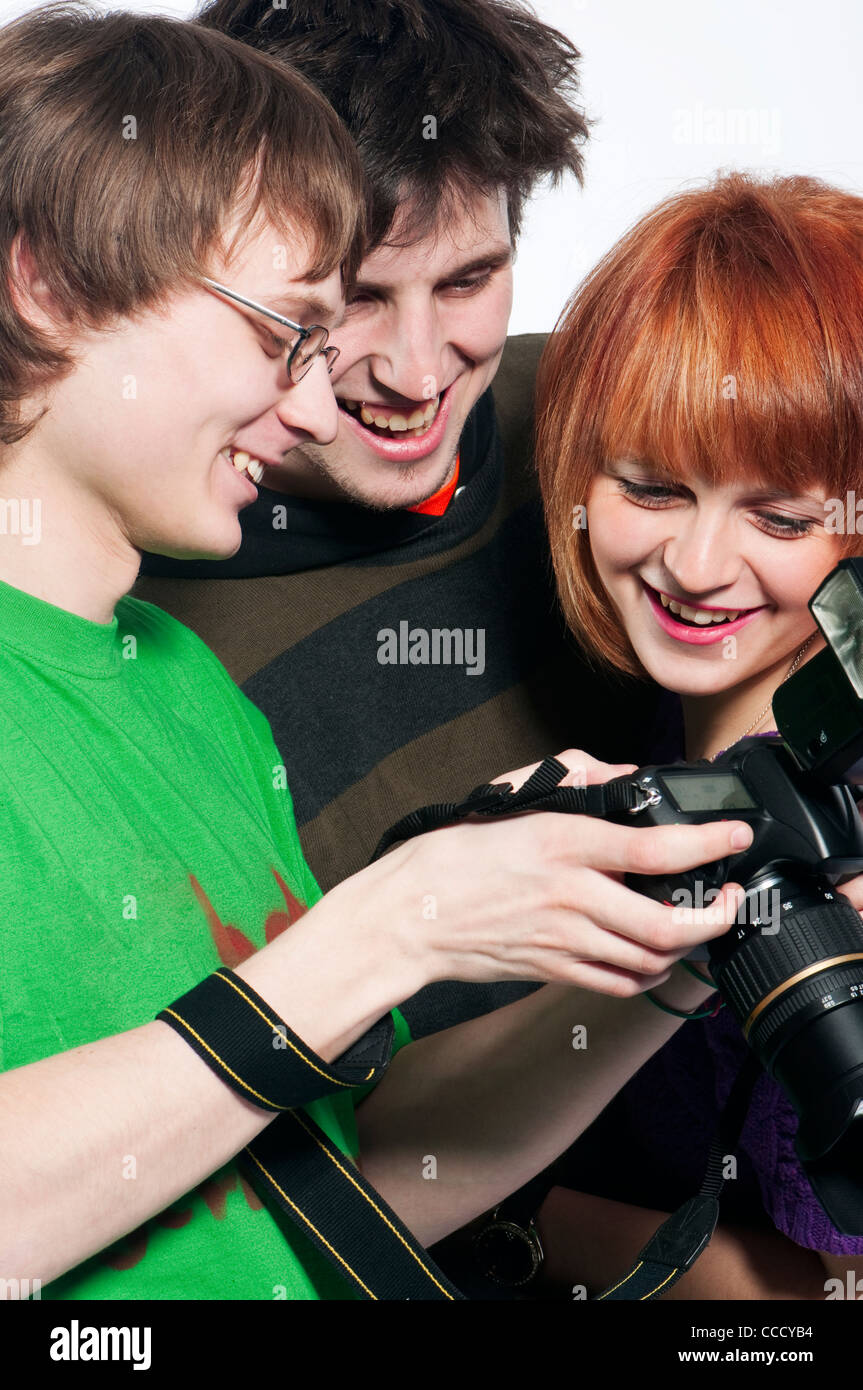 Photographer showing models image on the back of his digital slr Stock ...