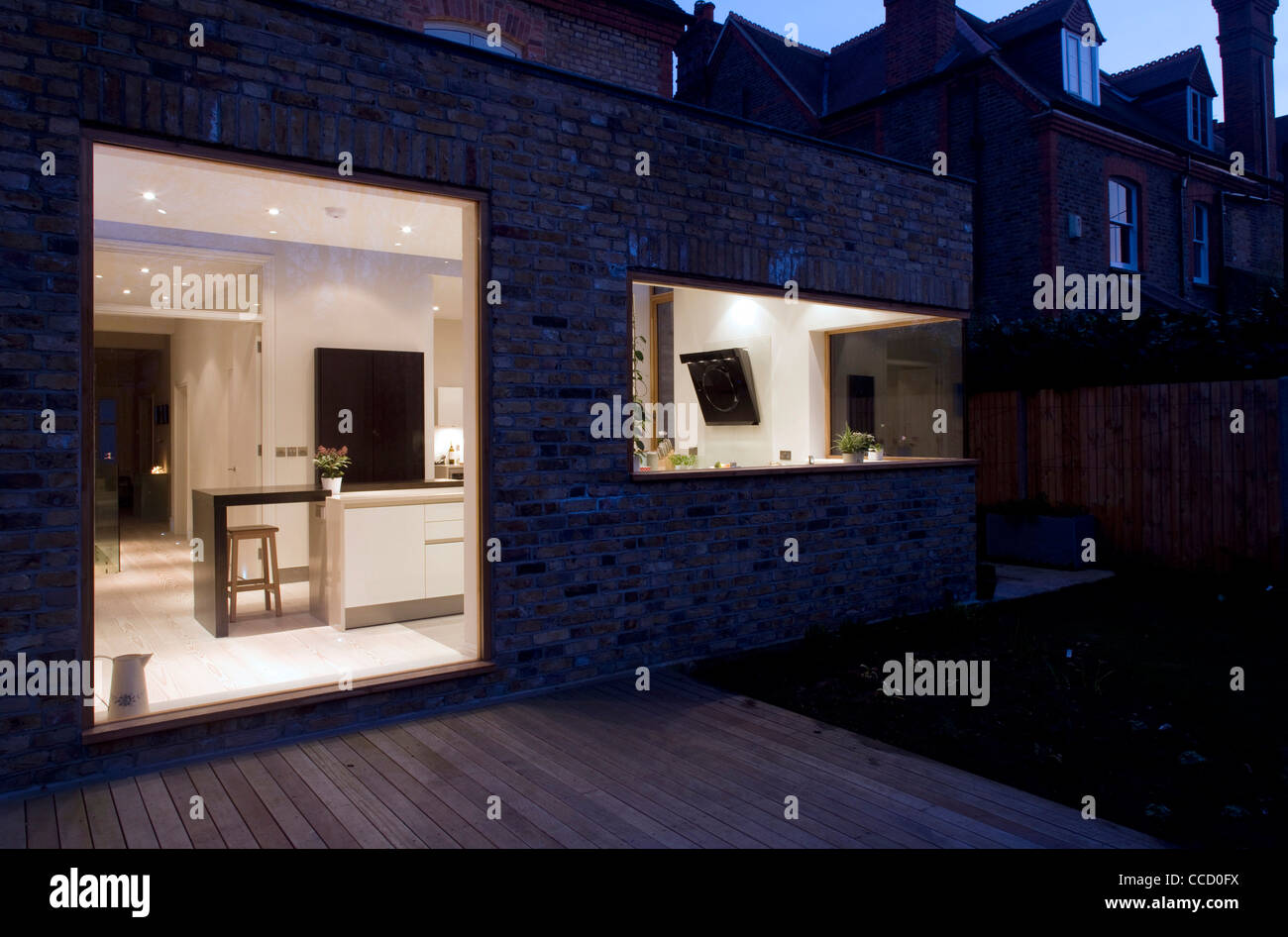 PRIVATE HOUSE. EXTERIOR VIEW OF PICTURE WINDOW AND KITCHEN Stock Photo ...