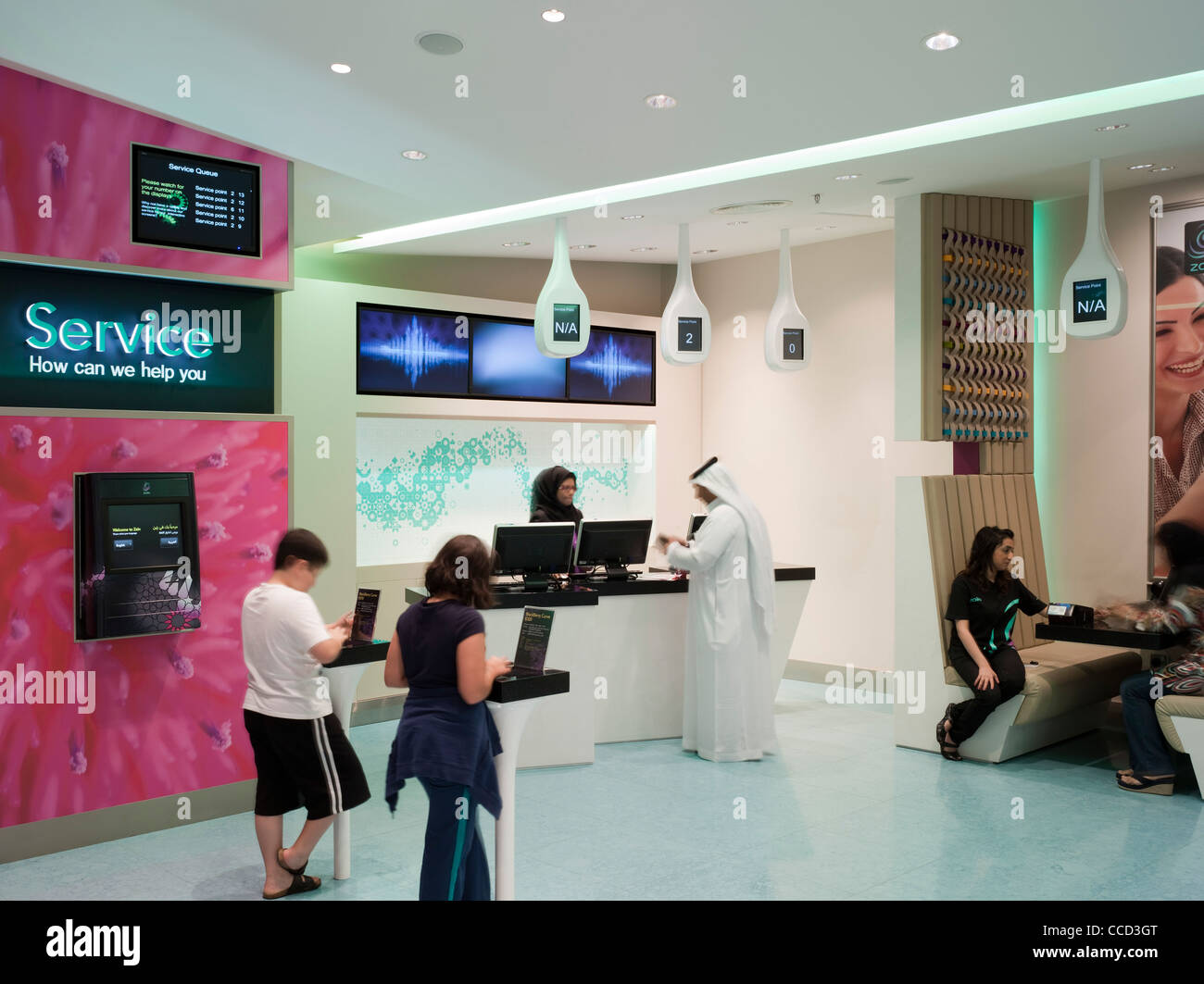 Customers buying phones hi-res stock photography and images - Alamy