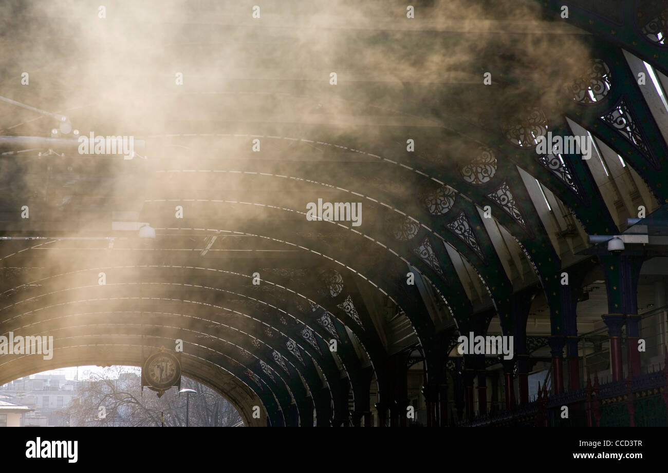 smoke rising through the air outside smithfield market Stock Photo - Alamy