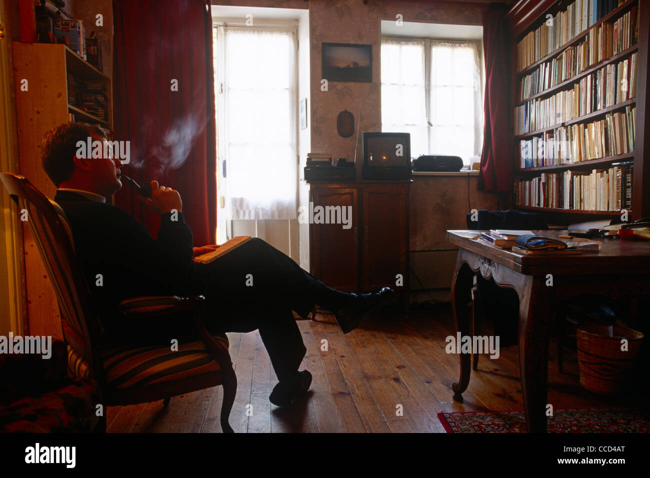 Priest smoking hi-res stock photography and images - Alamy