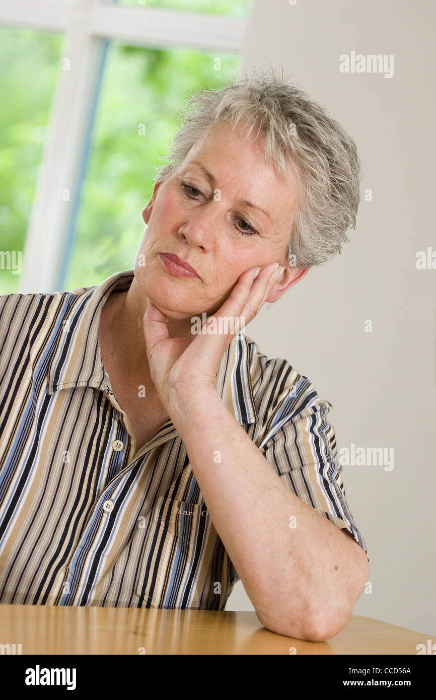 Thoughtful female person Stock Photo - Alamy