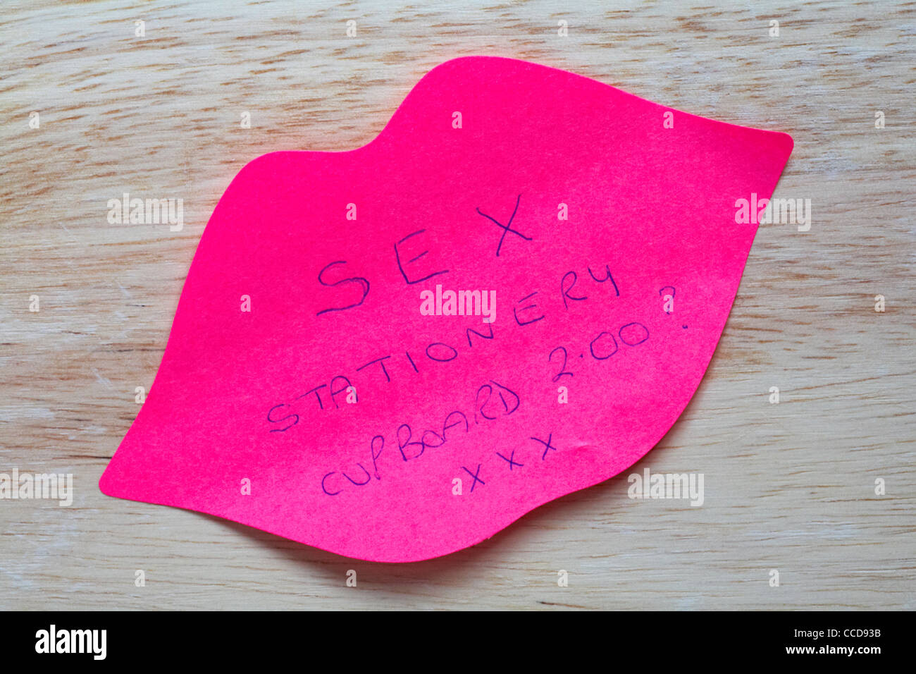 pink lips post it note sticker left on desk with hand written message ...