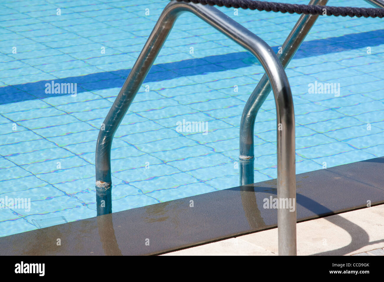 Swimming pool and handrail Stock Photo - Alamy