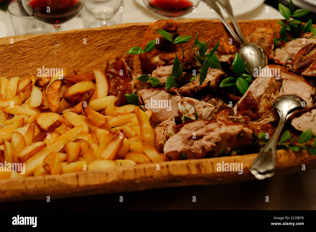 Rosted baby pork with potatoes, Sardinia, Italy Stock Photo - Alamy