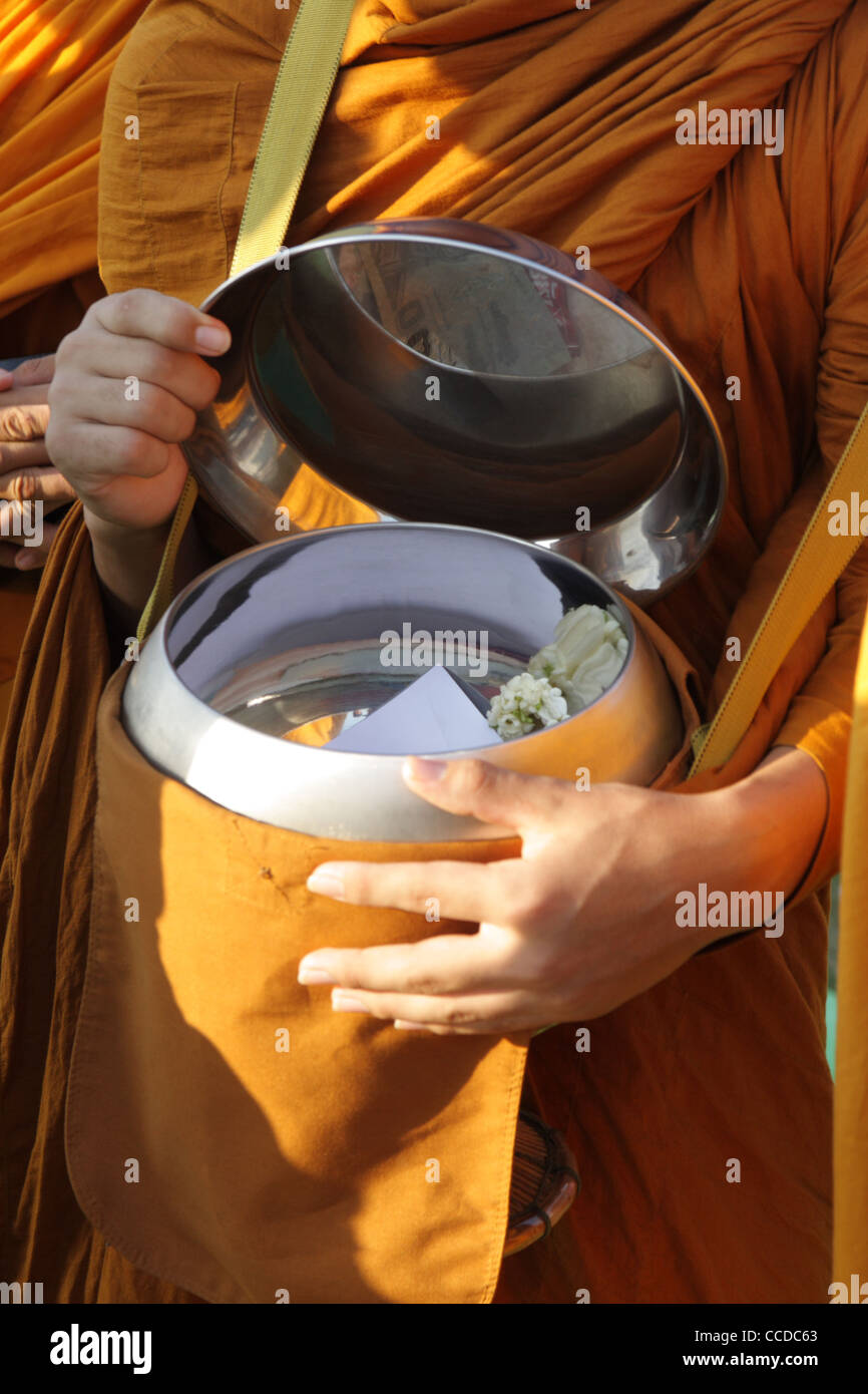 Buddhist monks alms bowl hi-res stock photography and images - Alamy