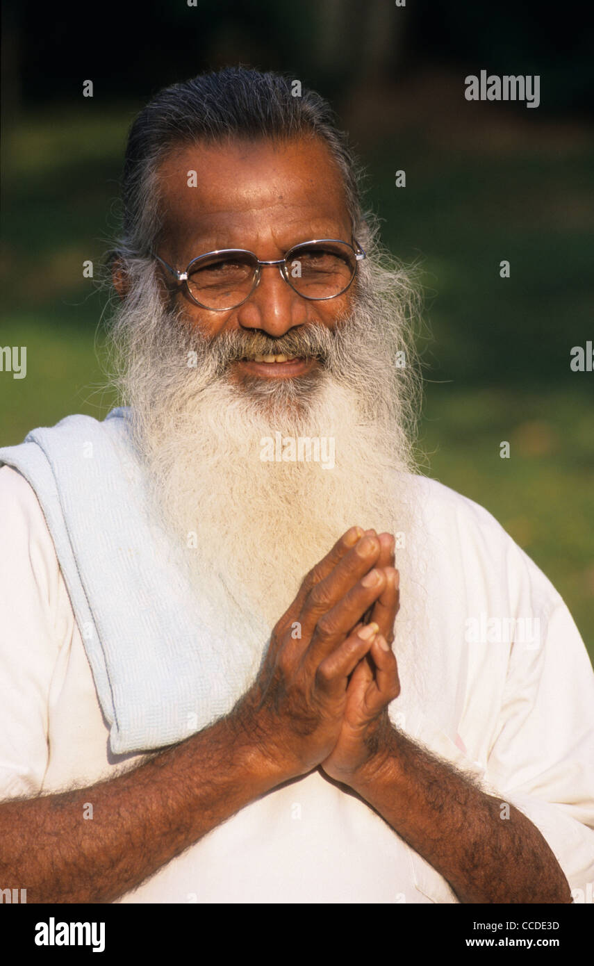 Old man greeting with hands, Dambulla, Sri Lanka Stock Photo - Alamy