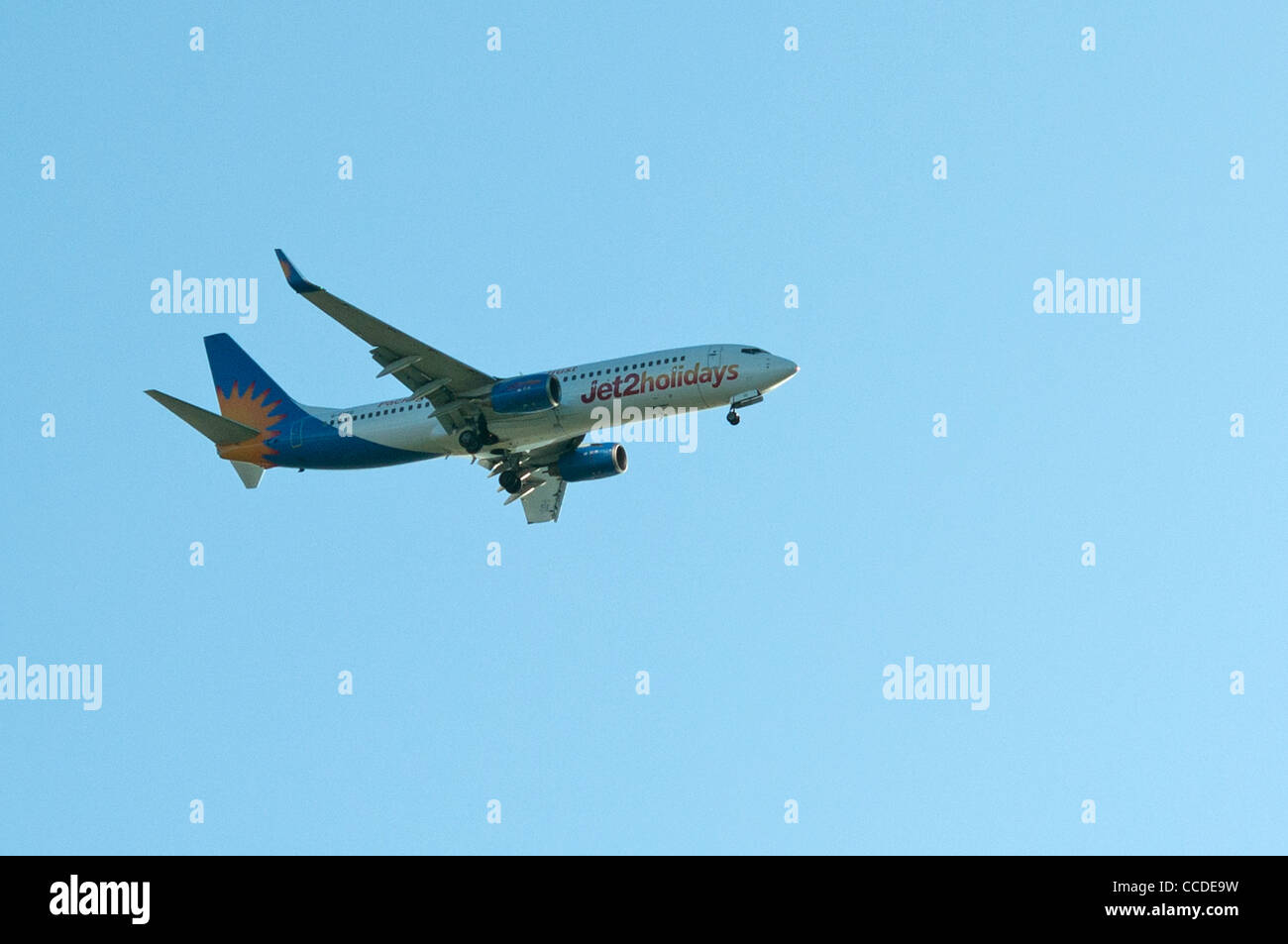 Jet airliner on it's final approach to an airport Stock Photo - Alamy