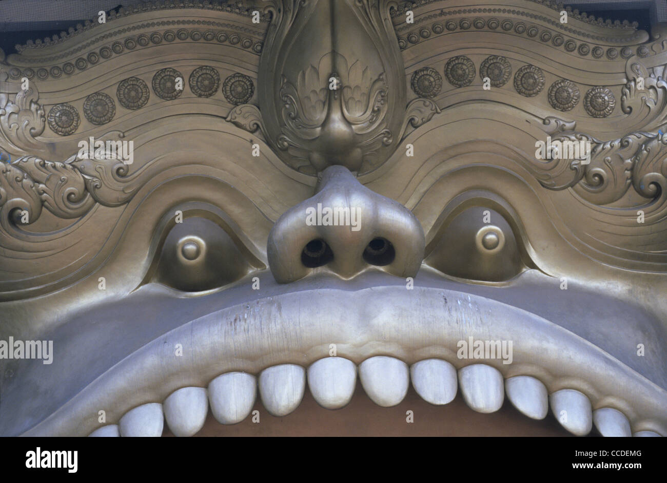 Detail of Golden temple architecture Buddha face, Dambulla cave temple ...