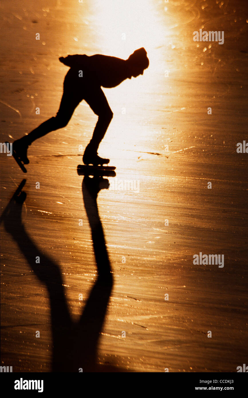 Shadow and Silhouette of speed skater Stock Photo - Alamy