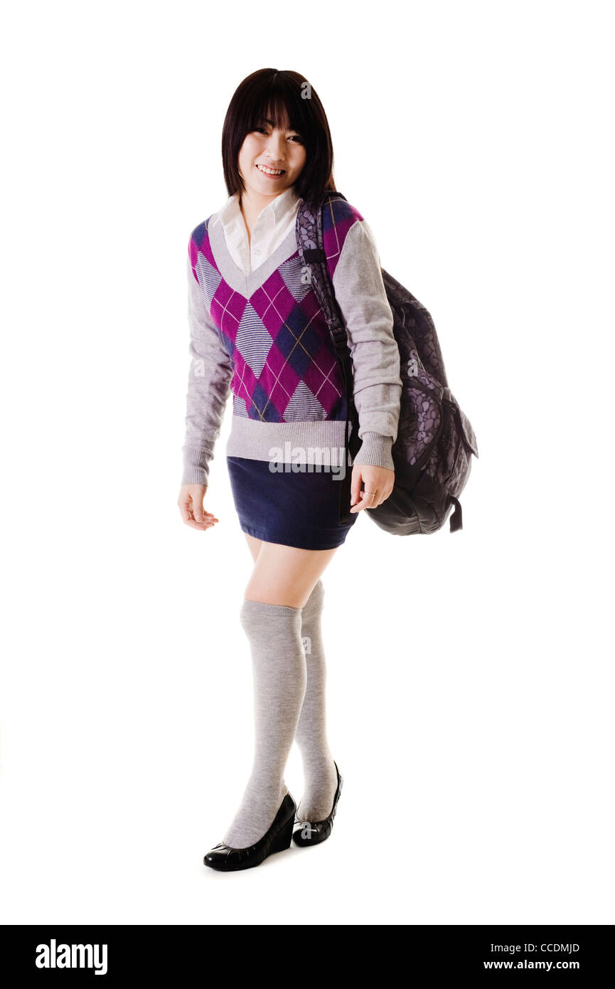 Female Chinese student with a backpack on a white background Stock ...