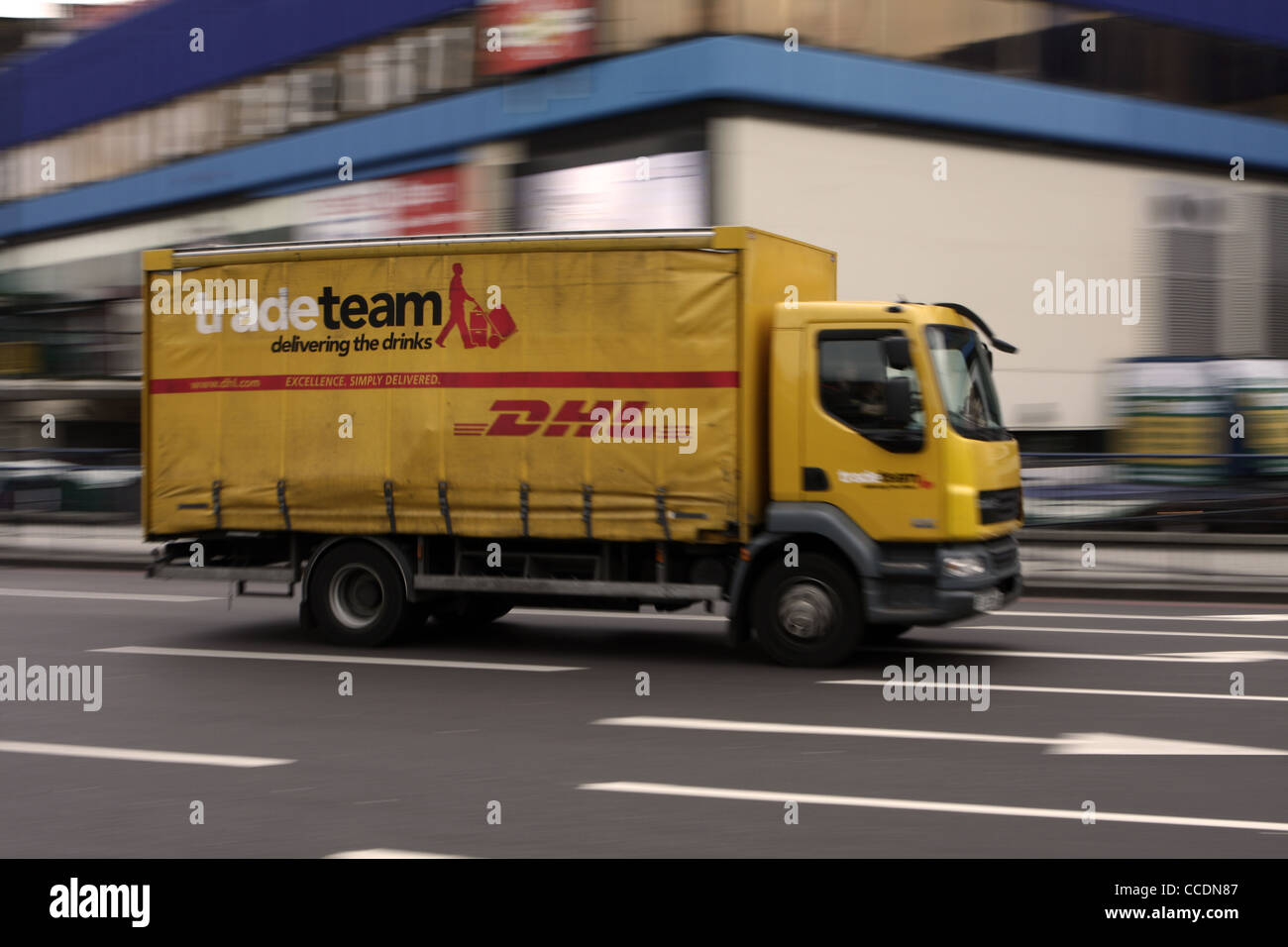 a 'DHL' truck traveling along a road in London, England Stock Photo - Alamy