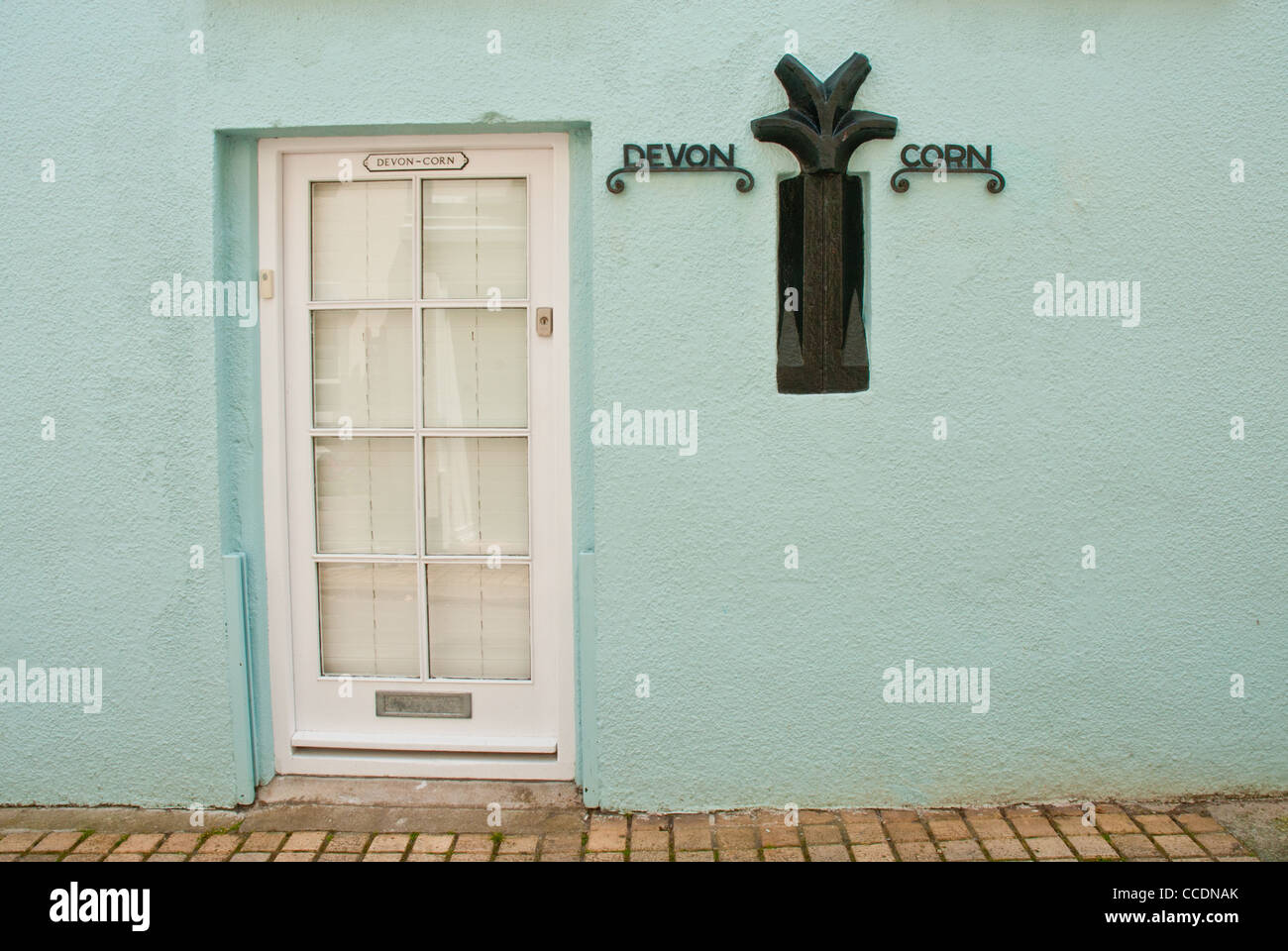 The old border of Devon and Cornwall marked on a house in Cawsand, with ...