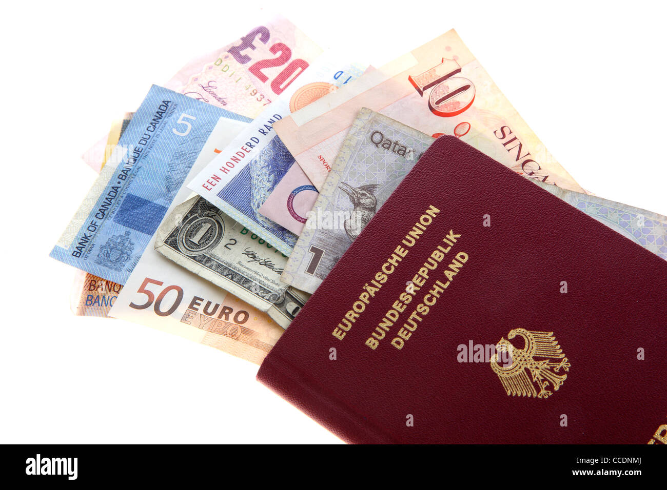 Travel documents, passport and different currencies, bank notes, cash ...