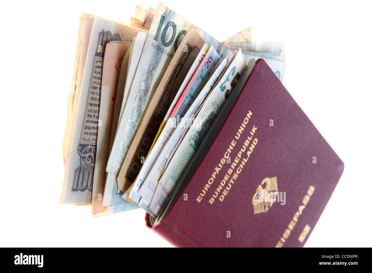 Travel documents, passport and different currencies, bank notes, cash ...
