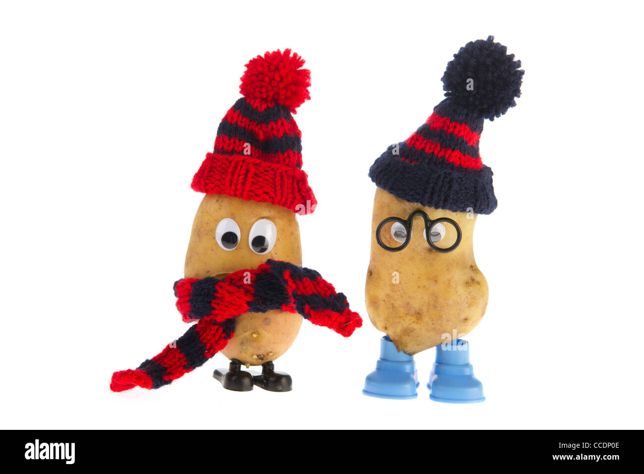 Two funny potato heads in winter outfit Stock Photo - Alamy