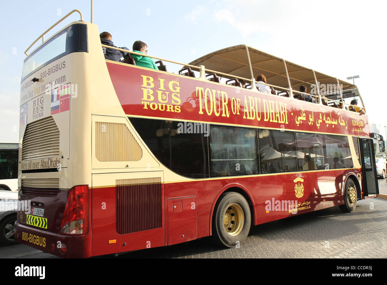 Touristic sightseeing tours on the Big Bus in Abu Dhabi Stock Photo - Alamy